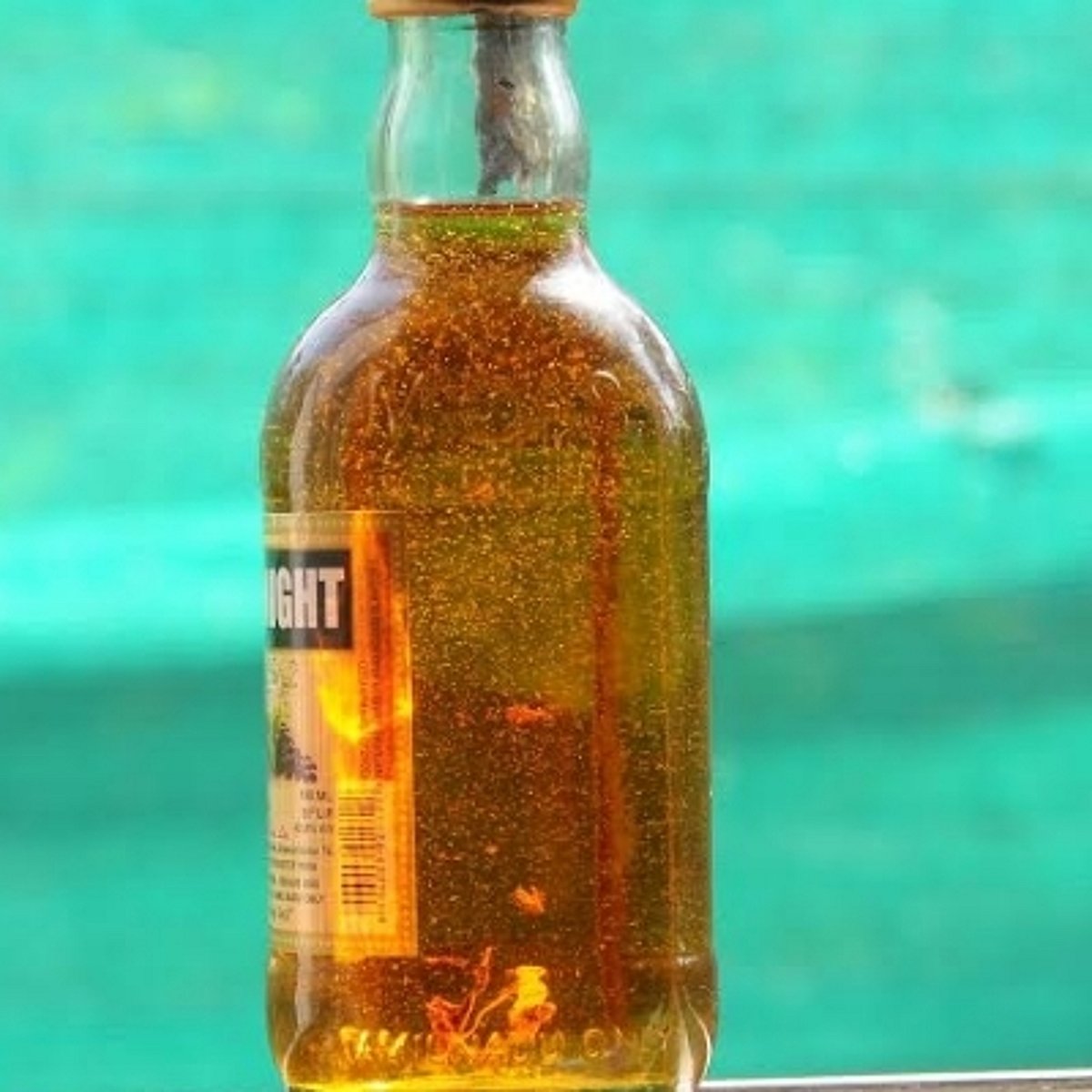 மிடாஸ் மது பாட்டில்களில் கலப்படம்...! தேனி பெண்ணின் கலகம் ...